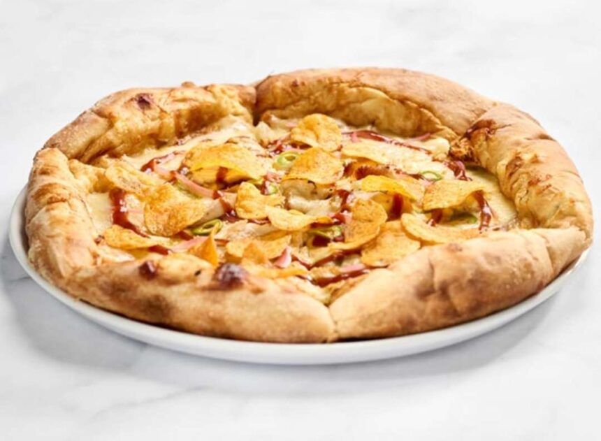 Shark Bites: Pizza Moon at Universal's Epic Universe - Theme Park Shark